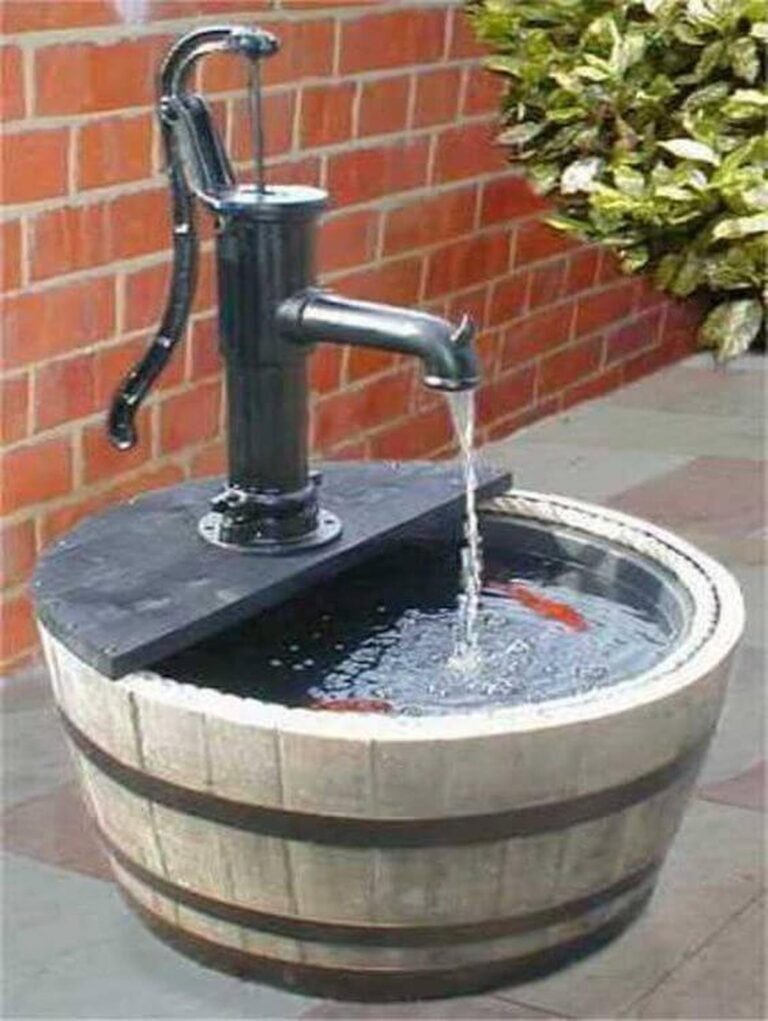 23 Unique Uses for Old Hand Pumps in Gardens