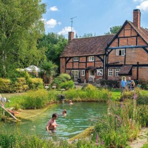 24 Stunning Natural Swimming Pond Ideas for a Relaxation Oasis