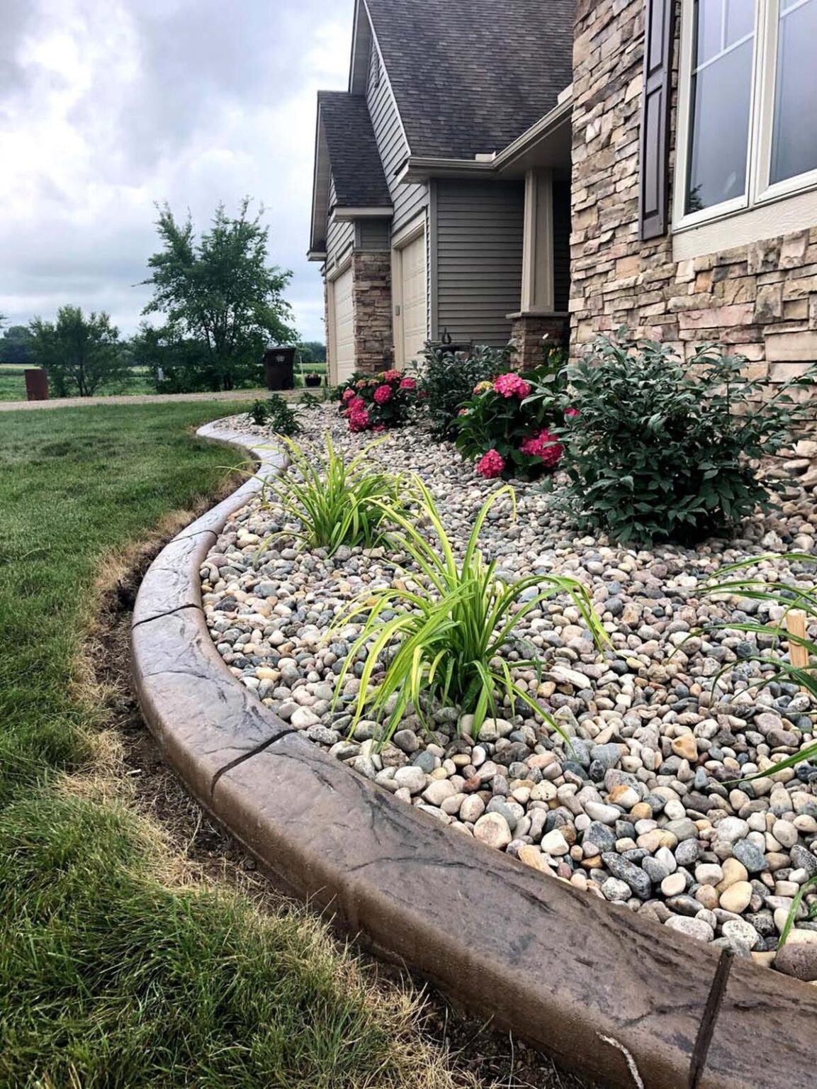 27 Best River Rock Ideas for Your Front Yard Landscape