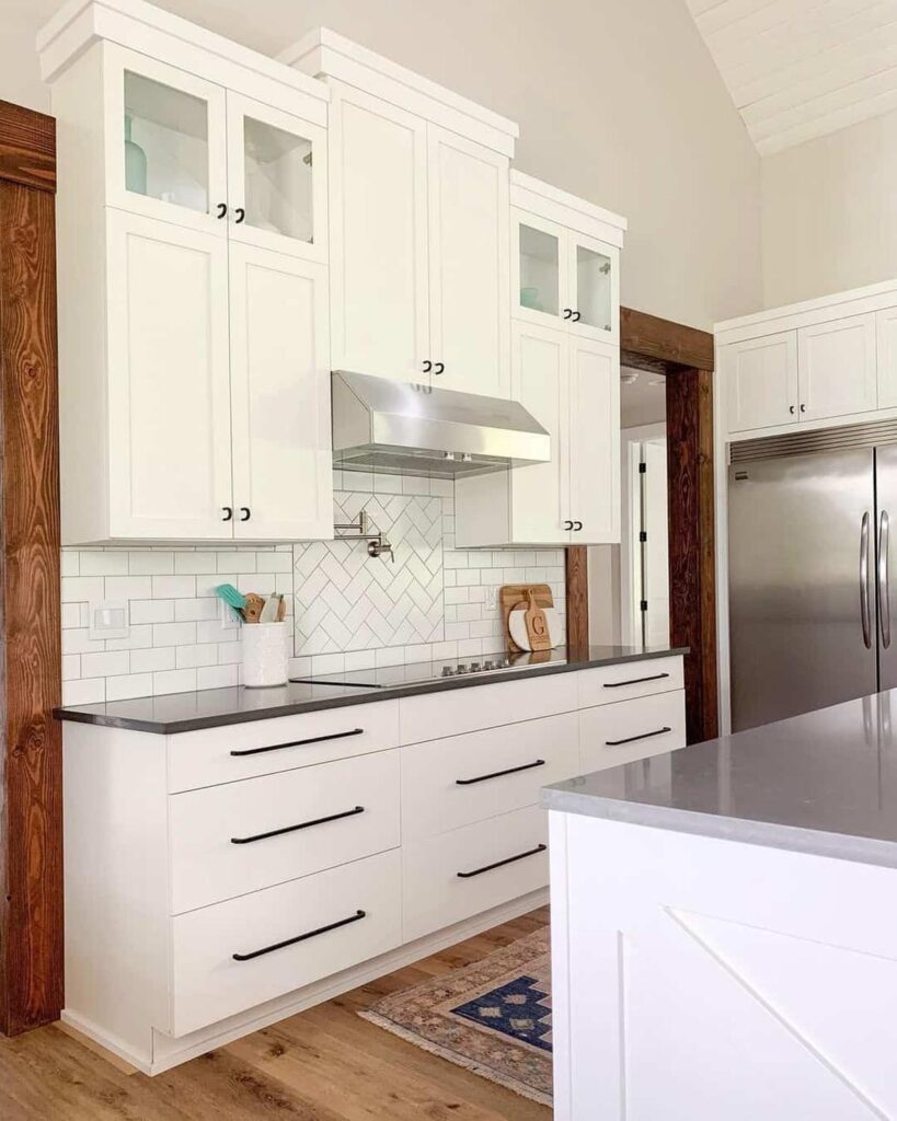22 White Kitchen Cabinets That Shine with Dark Countertops ...