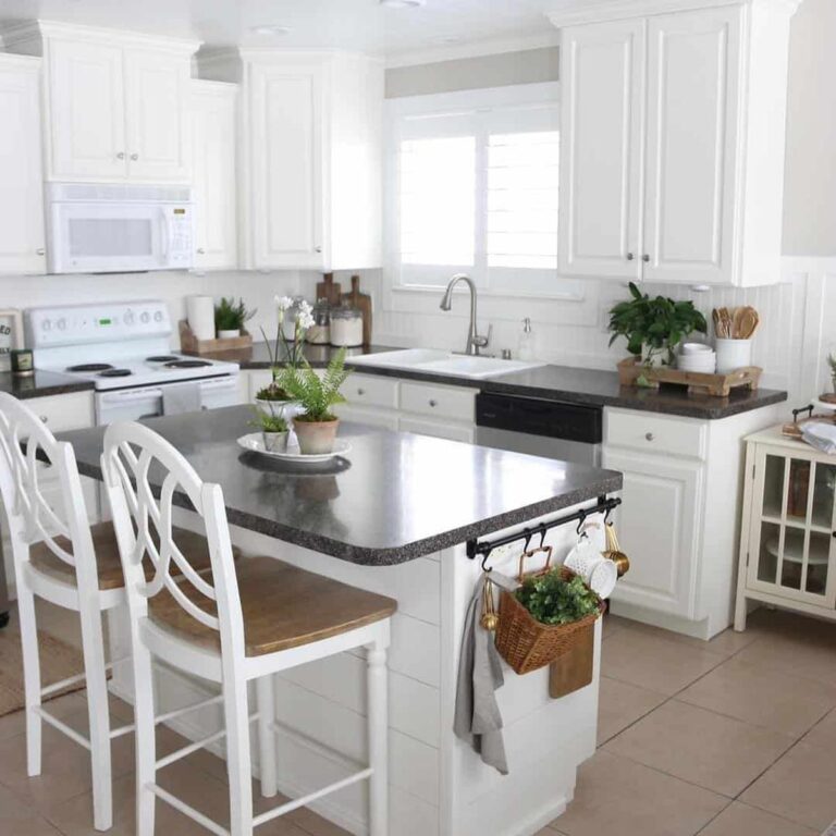 22 White Kitchen Cabinets That Shine with Dark Countertops ...