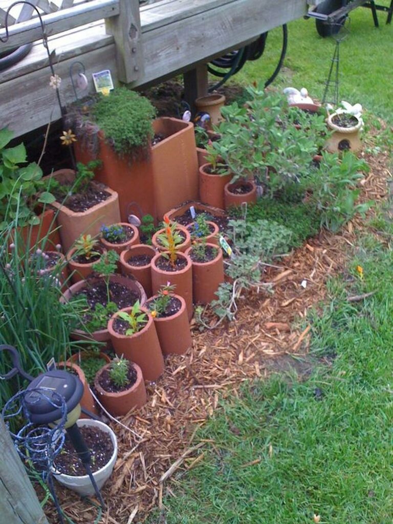 37 Elegant Pipe and Tower Planters for Compact Spaces