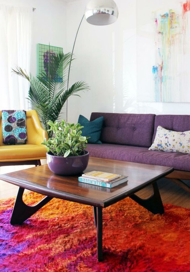 37 Elegant Ideas For Incorporating A Purple Sofa Into Your Home