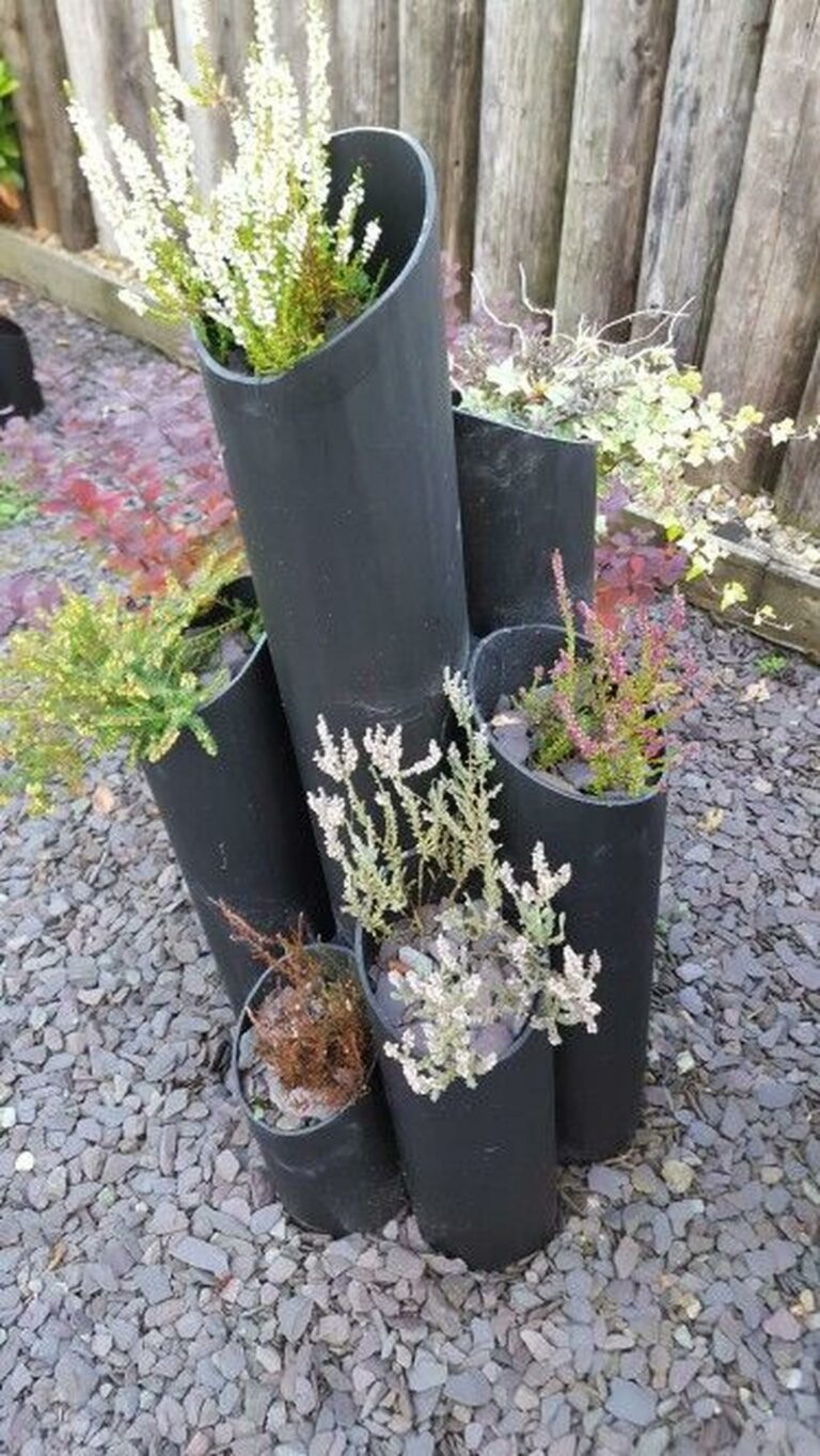 37 Elegant Pipe and Tower Planters for Compact Spaces