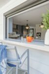 15 Clever Pass-Through Kitchen Window Ideas for Your Home