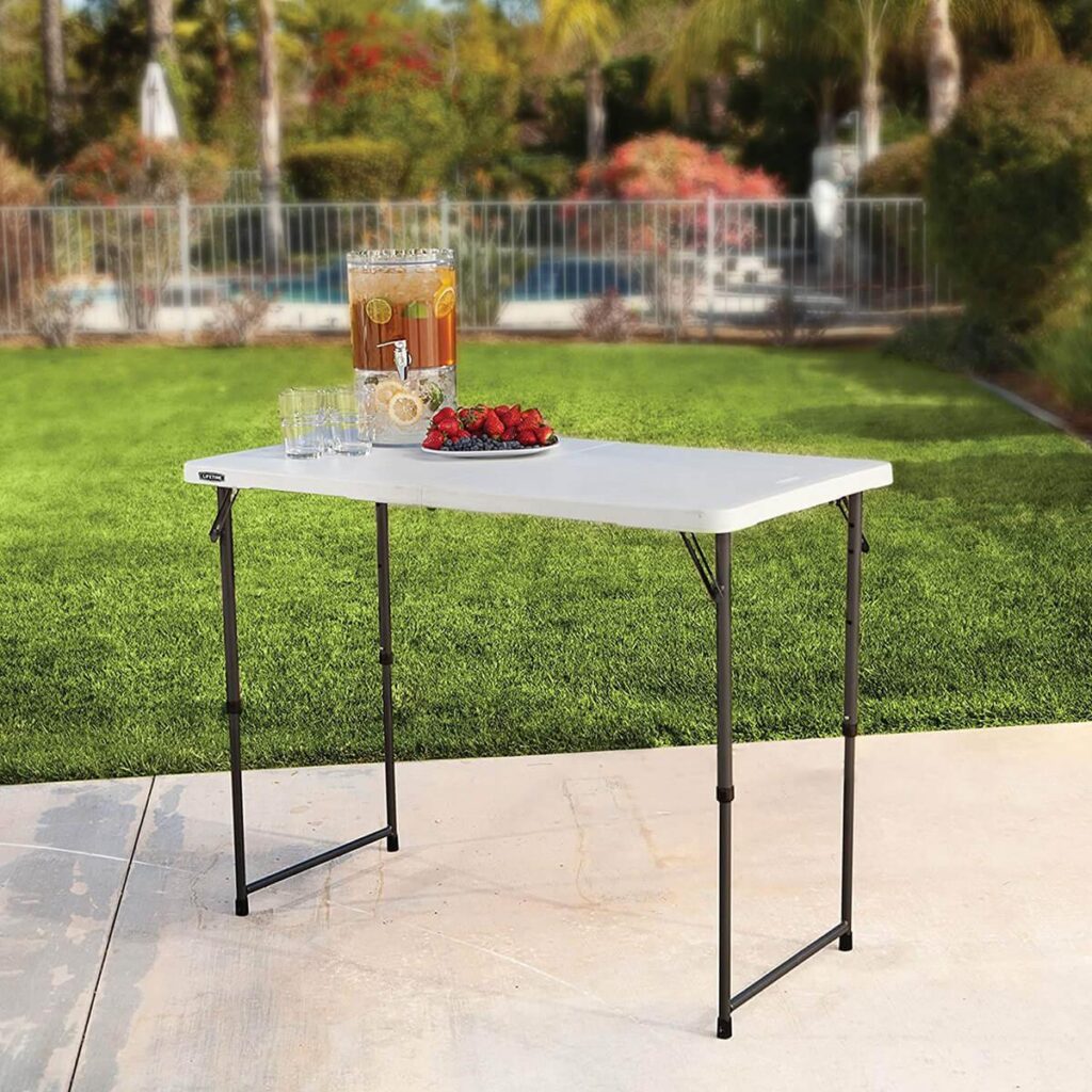 25 Perfect Outdoor Tables for Summer Fun