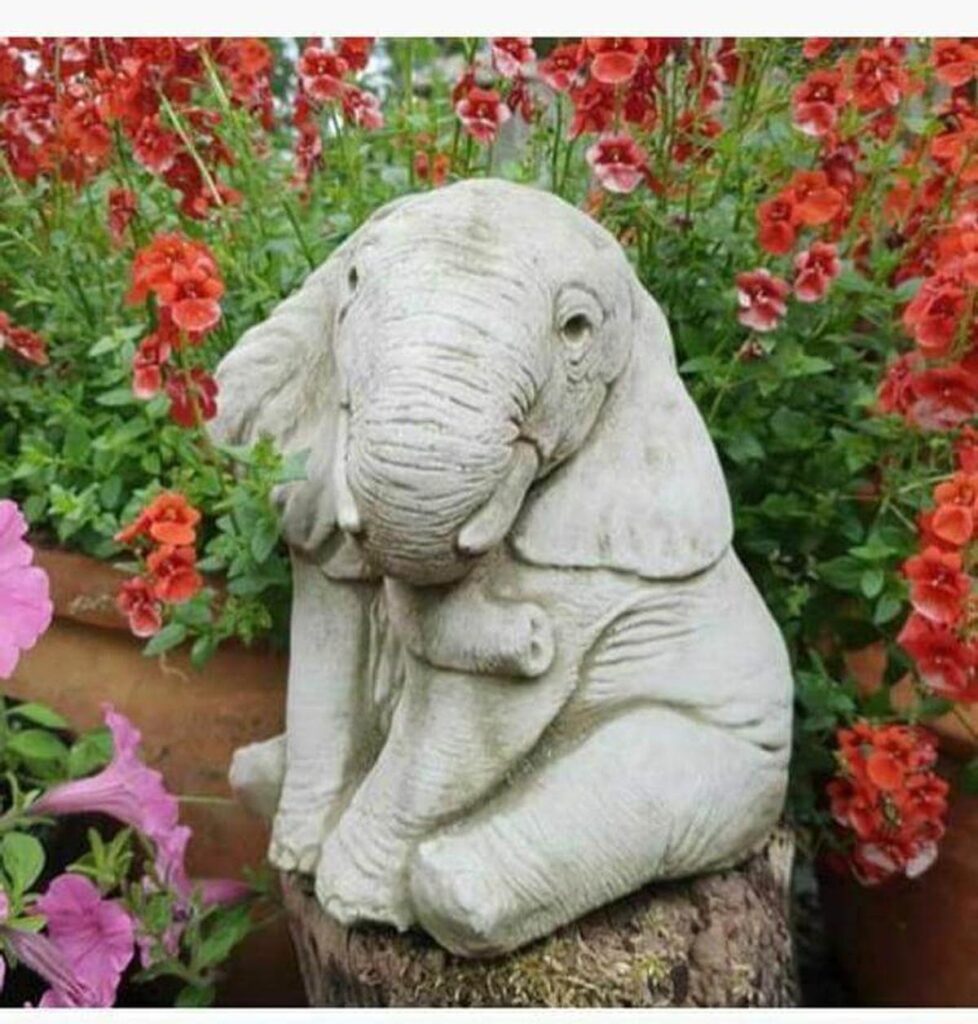 25 Eye-Catching Concrete Garden Sculptures