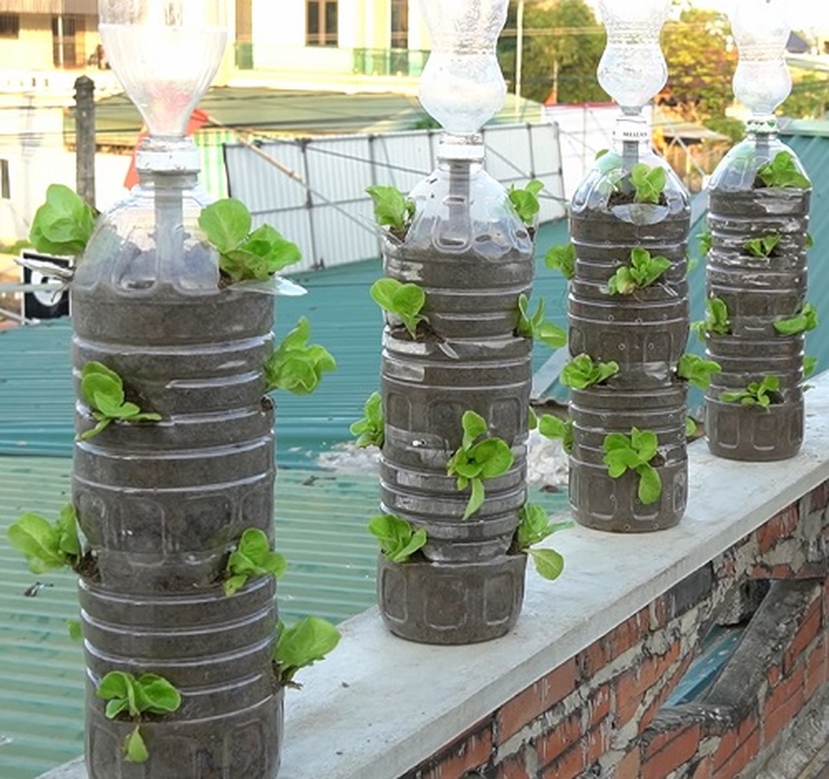 14 Amazing DIY Vertical Plant Tower Ideas for Flowers & Veggies