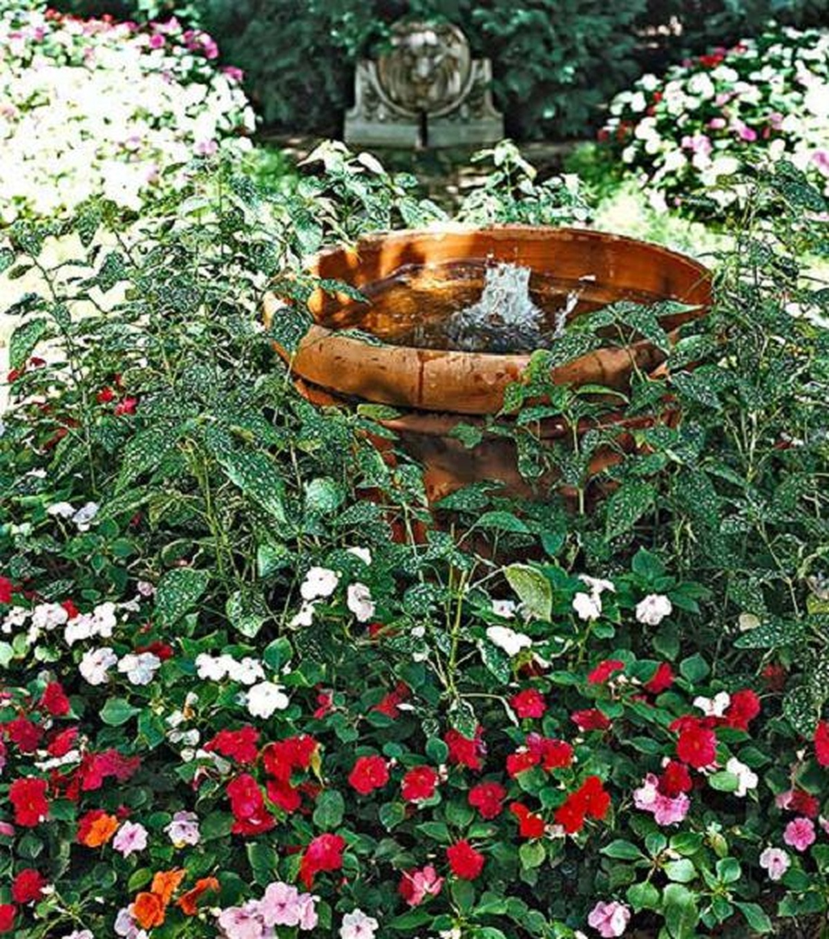 14 Charming DIY Container Water Fountain Ideas for Your Garden