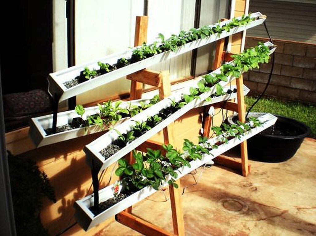 13 Clever Vertical DIY Rain Gutter Garden Ideas For Small Spaces