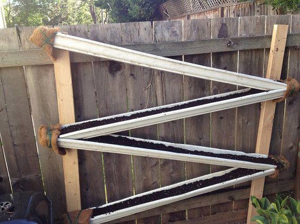 13 Clever Vertical DIY Rain Gutter Garden Ideas For Small Spaces