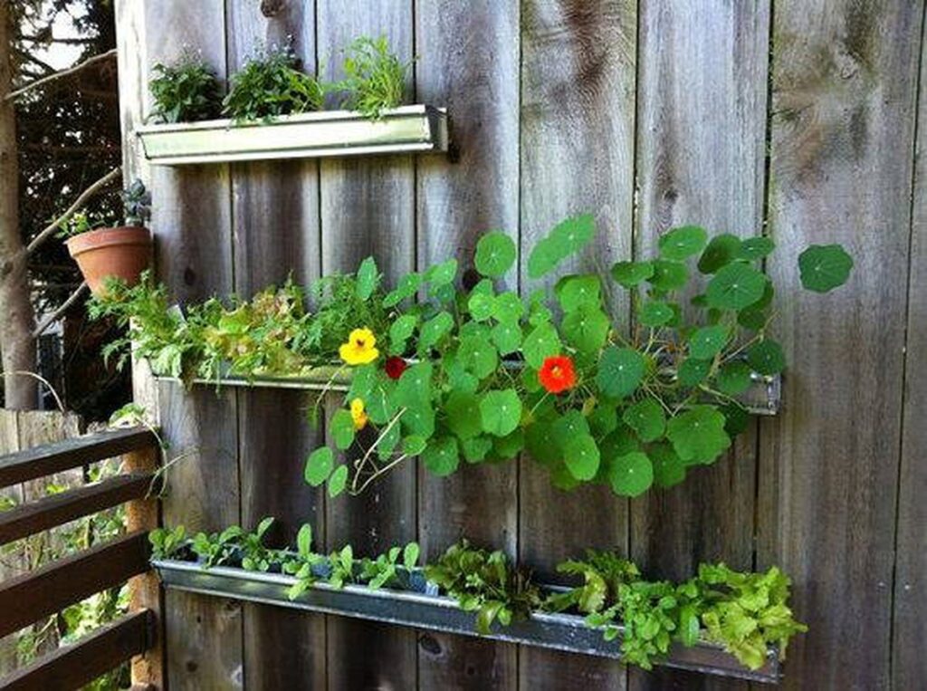 13 Clever Vertical DIY Rain Gutter Garden Ideas For Small Spaces